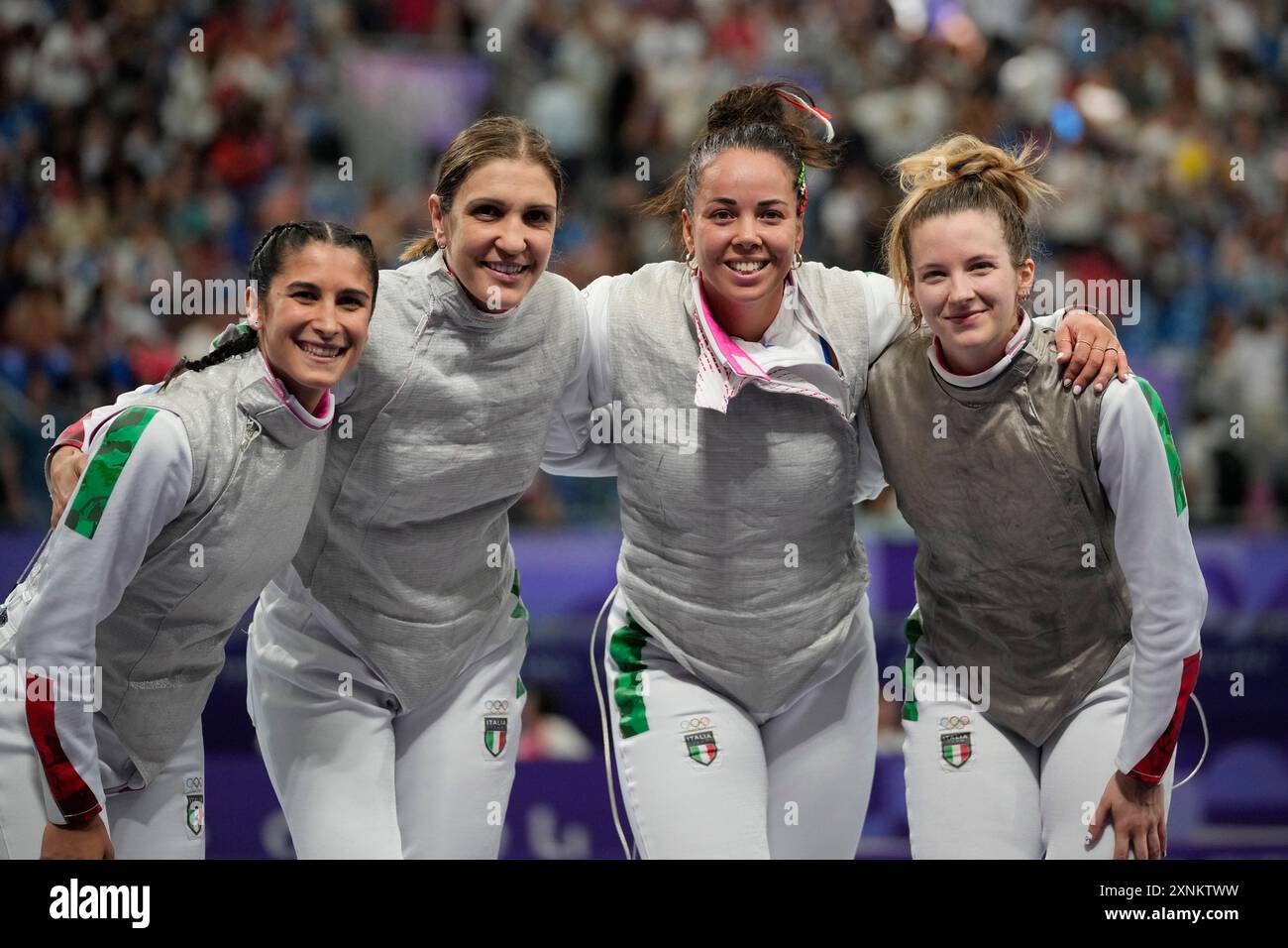 Italy's Alice Volpi, second right, celebrates with her teammate Arianna ...