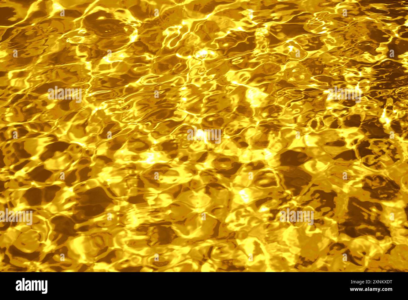 Gold fluid with ripples as background, closeup Stock Photo - Alamy