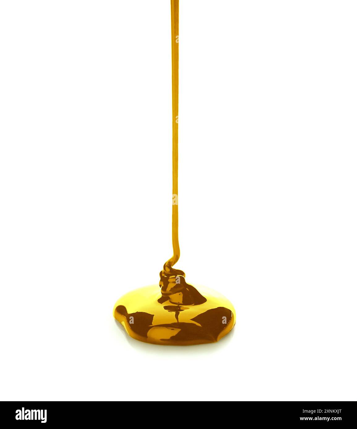 Pouring gold fluid on white background. Bright liquid Stock Photo - Alamy