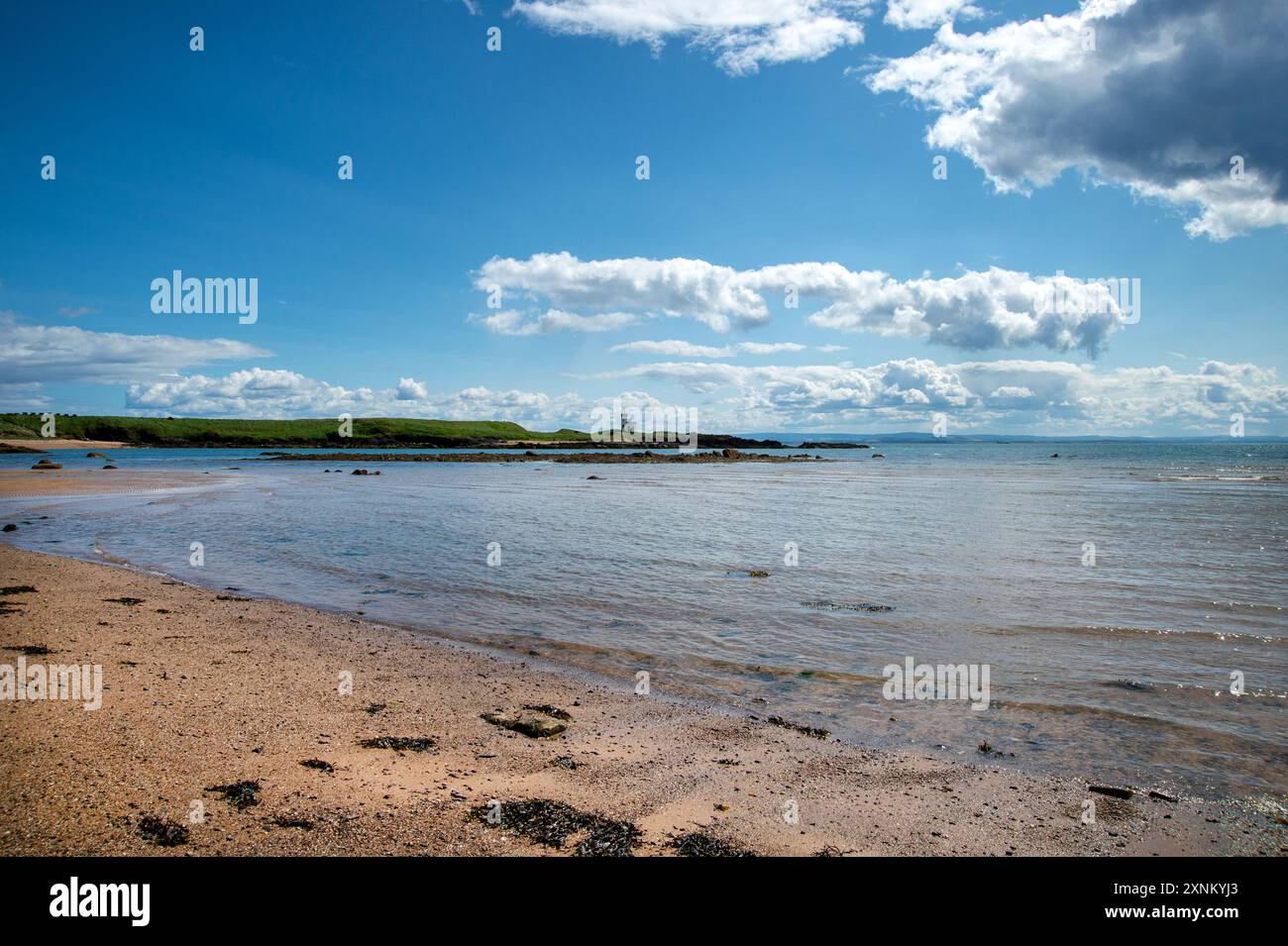 Elie lighthouse in the distance across Ruby bay at Elie Fife Scotland ...