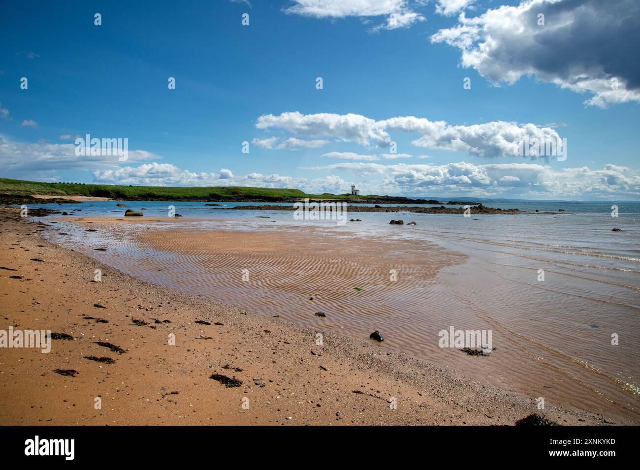 Elie lighthouse in the distance across Ruby bay at Elie Fife Scotland ...
