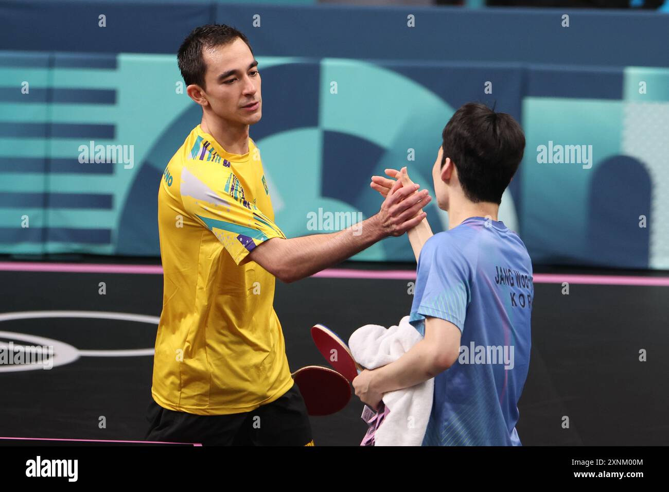 Paris, France. 1st Aug, 2024. Hugo Calderano (L) of Brazil clap hands ...