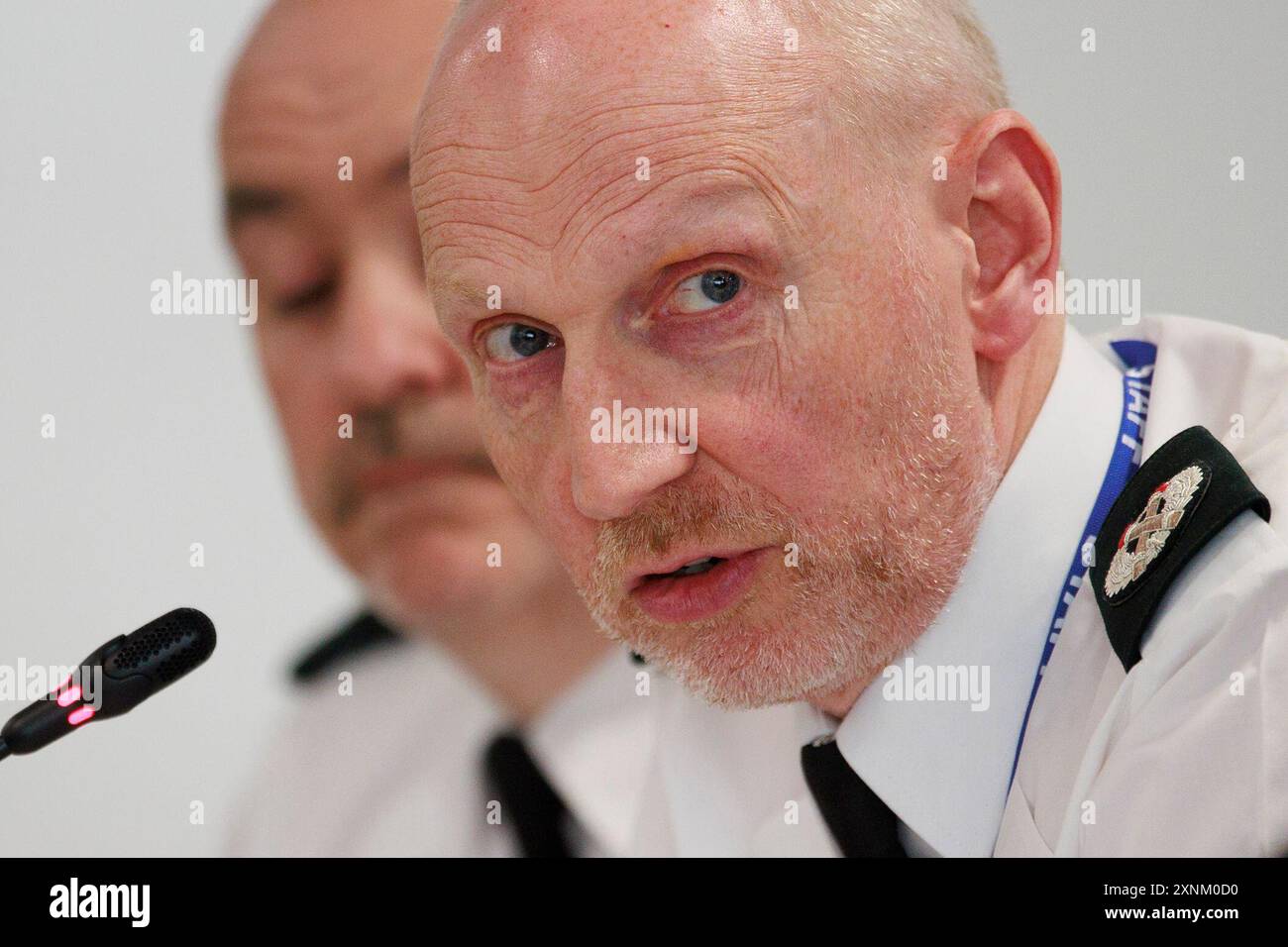 Temporary Assistant Chief Constable Davy Beck speaking during a meeting ...
