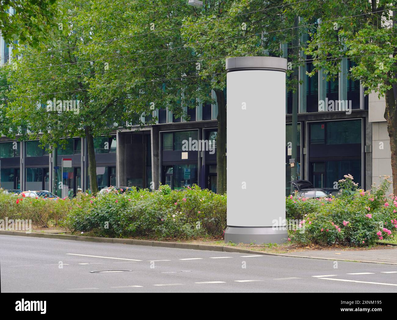 Empty advertising pillar in a city with grey free copy space, promotion ...