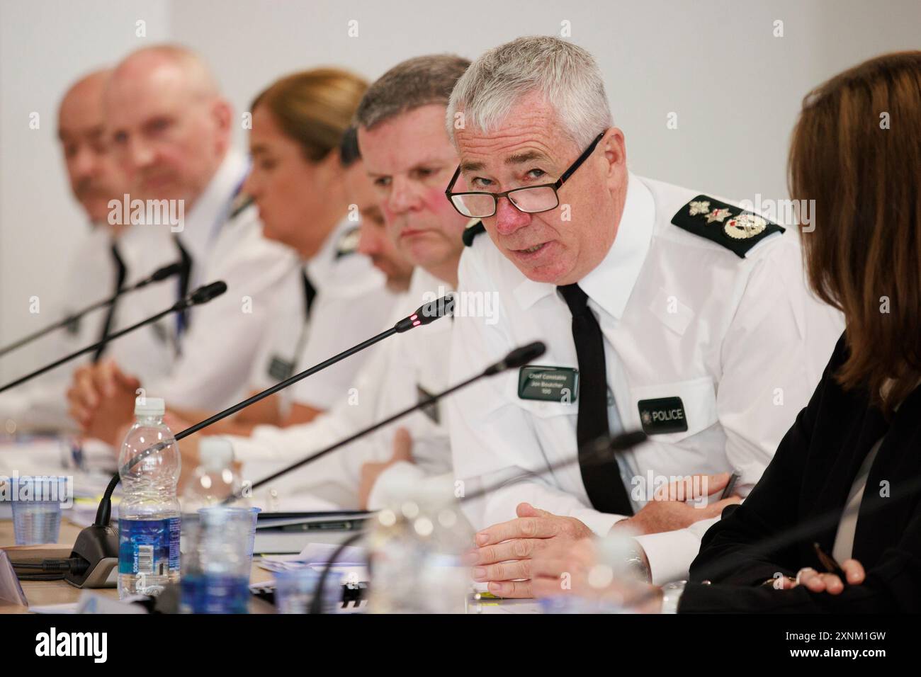 PSNI Chief Constable Jon Boutcher (centre right) speaking during a ...