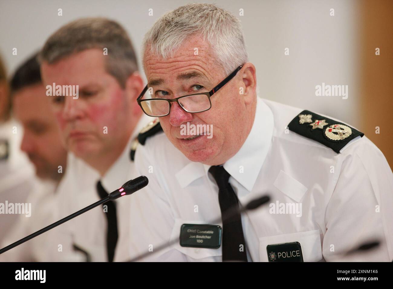 PSNI Chief Constable Jon Boutcher speaking during a meeting of the ...