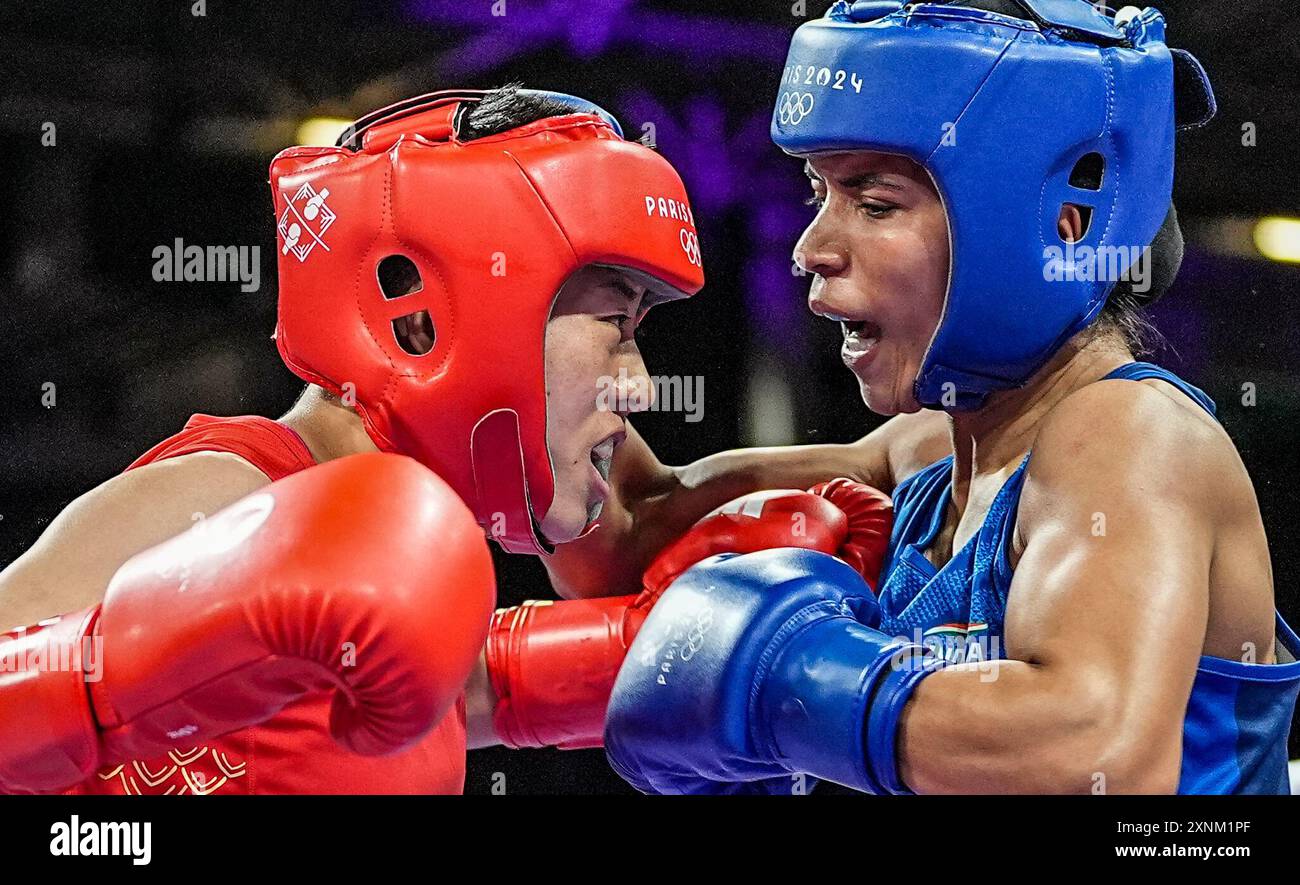 Paris, France. 1st Aug, 2024. Wu Yu (L) of China competes against ...