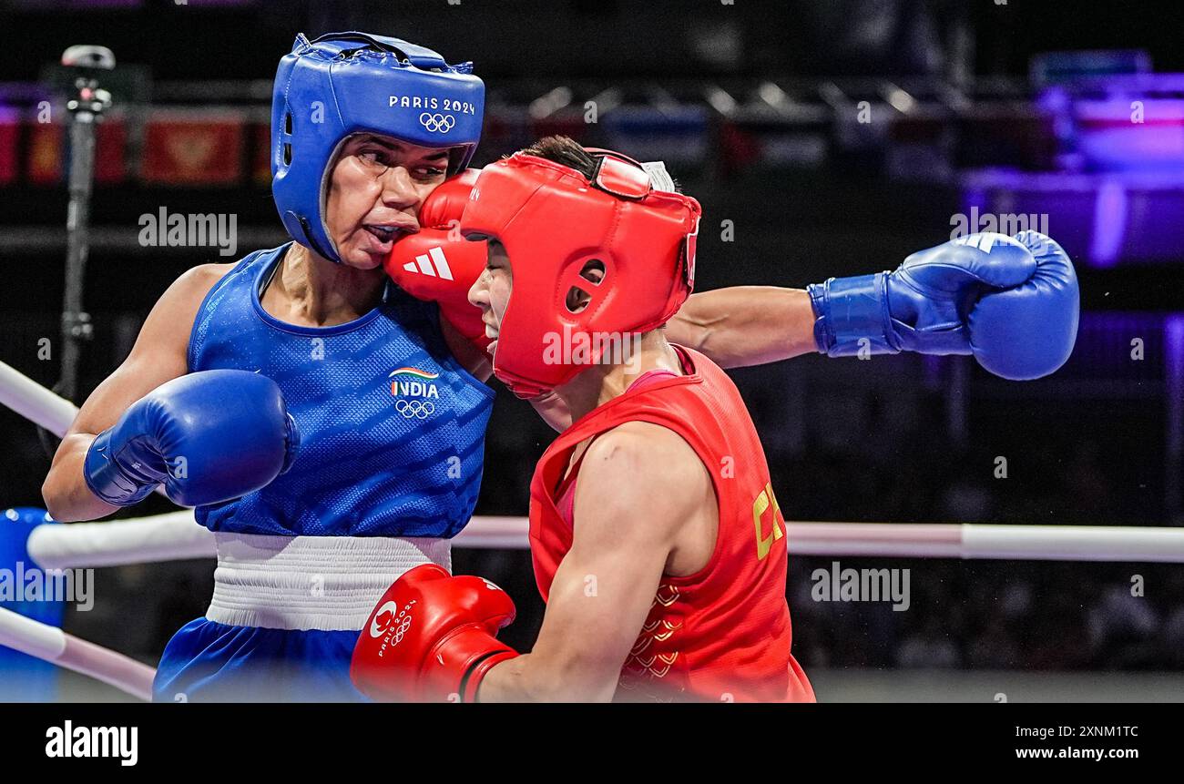 Paris, France. 1st Aug, 2024. Wu Yu (R) of China competes against ...