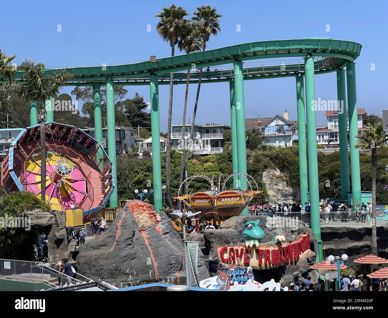 Visitors enjoying the rides and attractions at the Santa Cruz Beach ...