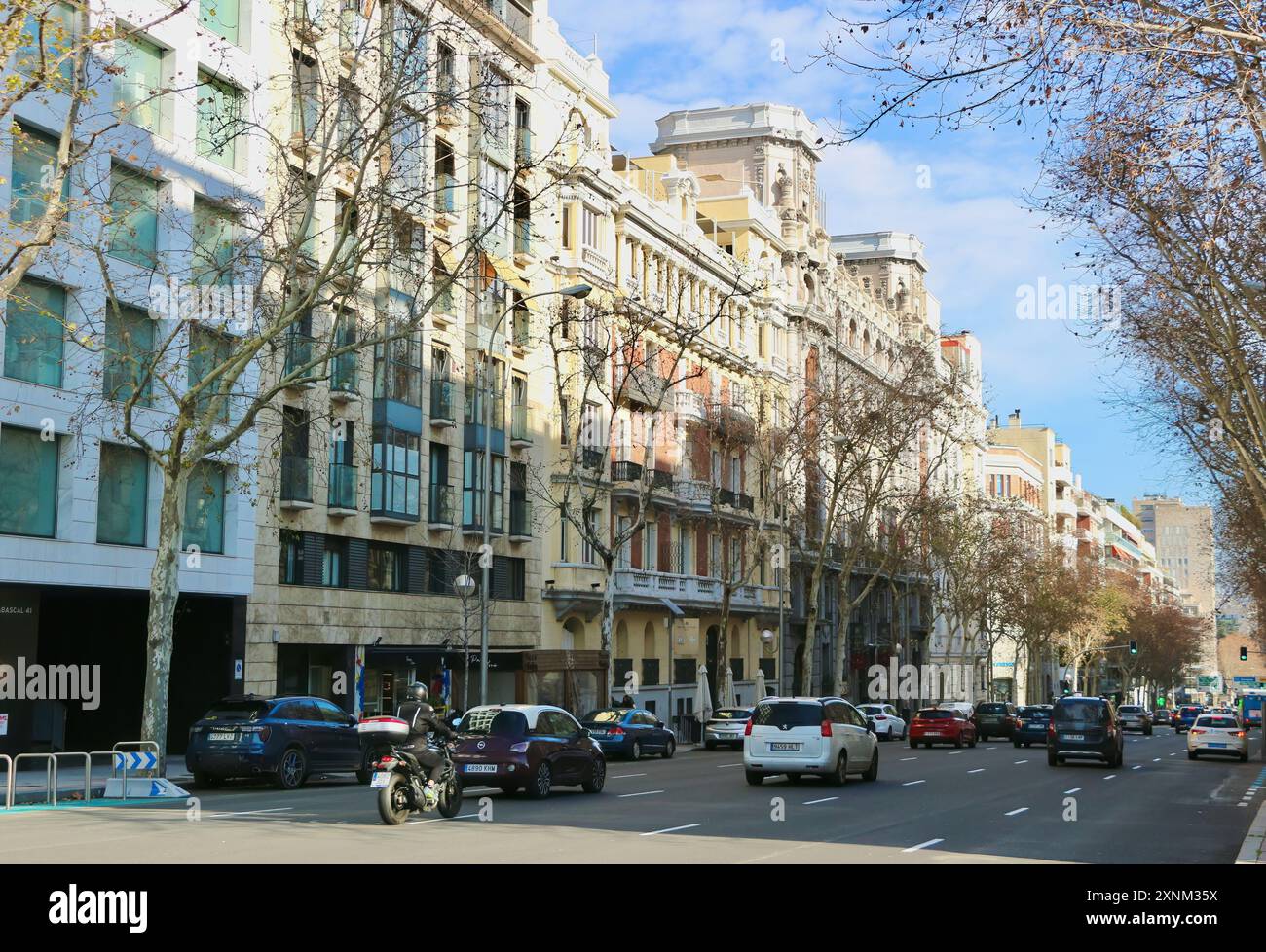 One way wide street with traffic in the city centre of Madrid Spain ...