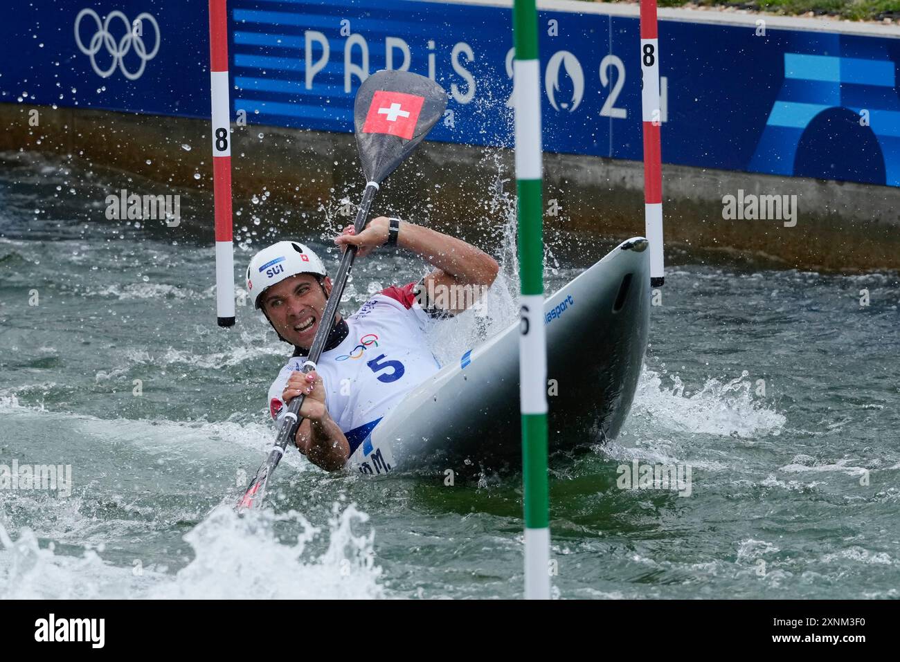 Martin Dougoud of Switzerland competes in the men's kayak single finals ...