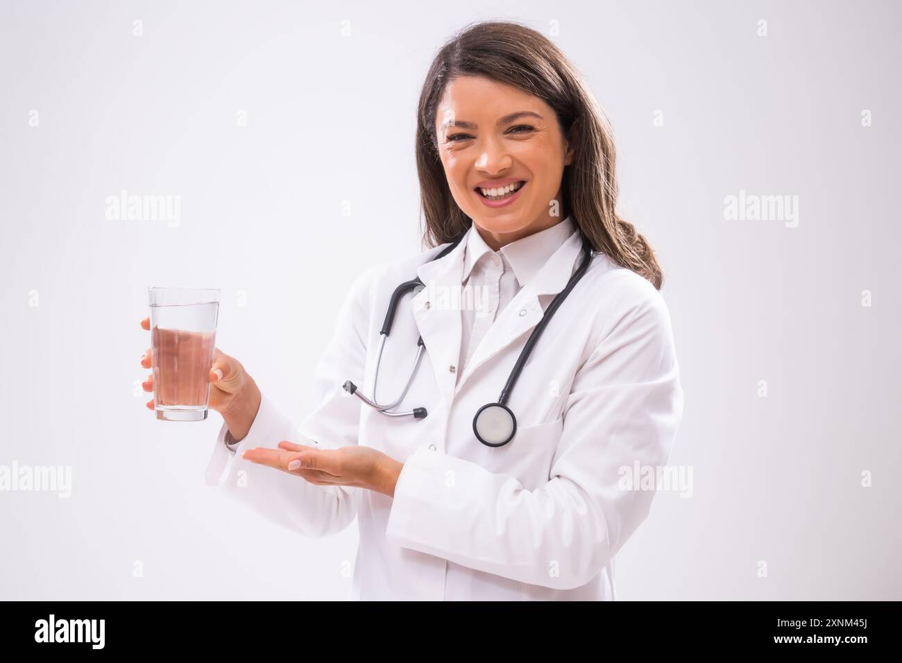 Nurse holding medicine glass water hi-res stock photography and images ...