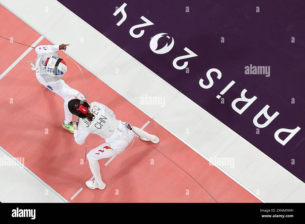 Paris, France. 1st Aug, 2024. Jiao Enqi (R) of China competes with ...
