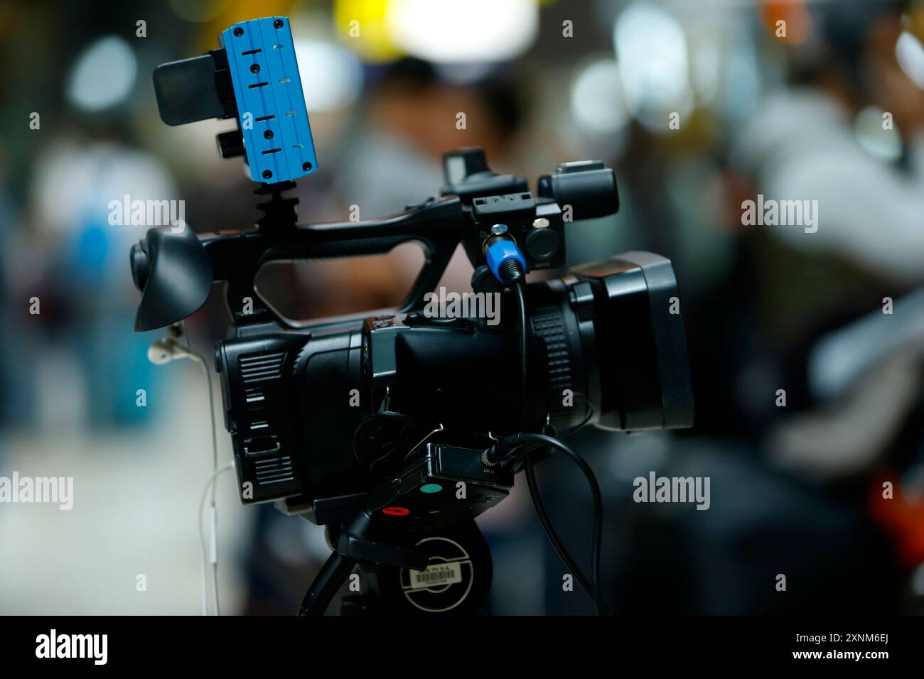 television camera on location with background out of focus Stock Photo ...