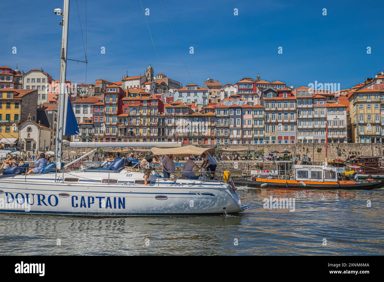 PORTO, PORTUGAL - APRIL 11, 2024: View with old multi-colored houses ...