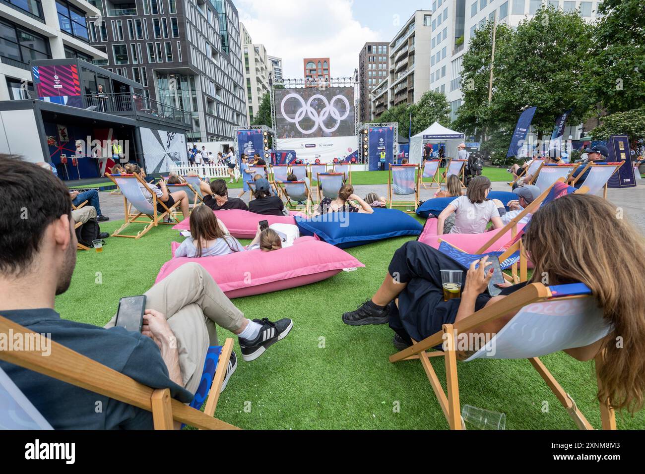 London, UK. 1 August 2024. Fans watch the action on the big screen at ...