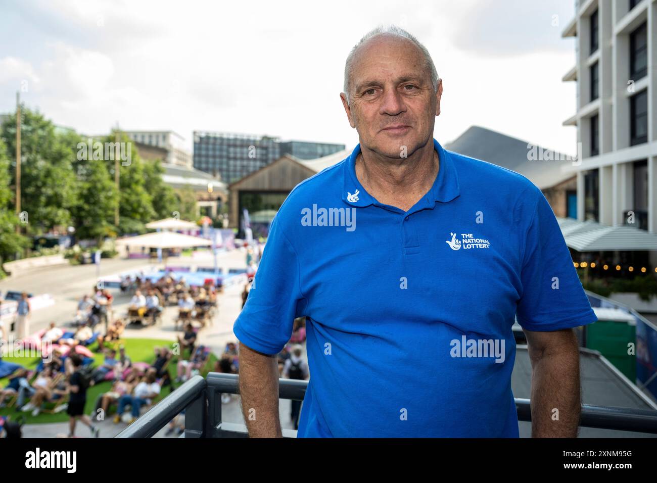 London, UK. 1 August 2024. Sir Steve Redgrave as fans in 30C heat watch ...