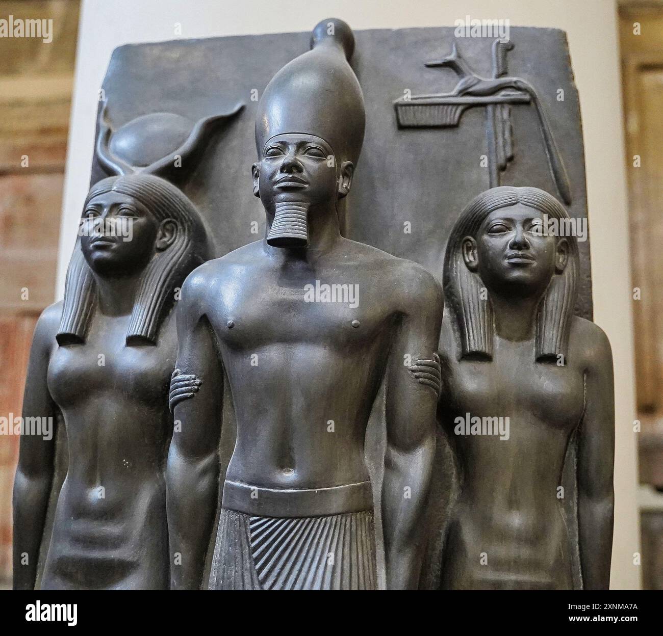 Cairo,Egypt,December 31,2019-Menkaure Triad carving with Menkaure,Hathor,Cynopolis Goddess with ...