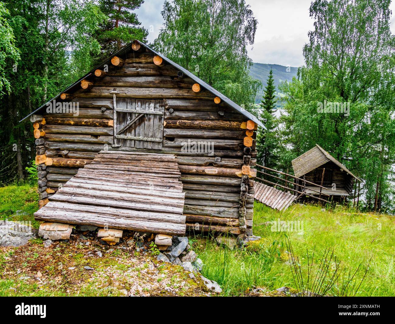 Reconstructed timber farm buildings at the Valdres Folk Museum in ...