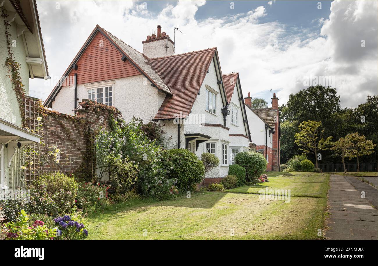 Port Sunlight, Wirral, UK - July 26th 2024 - Looking up a hill past ...