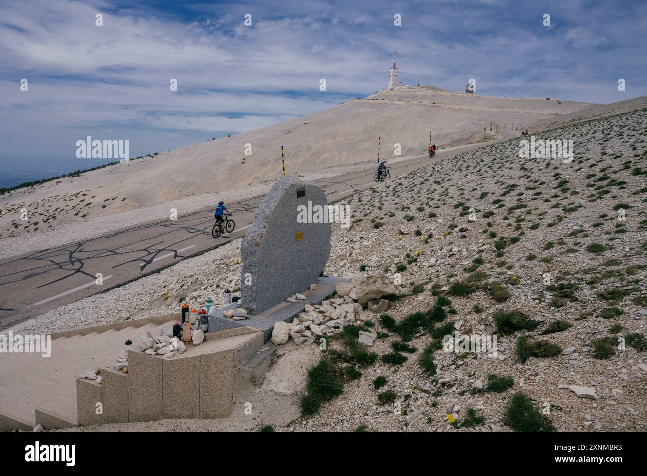 Cyclists passing the memorial to Tour de France cyclist Tom Simpson who ...