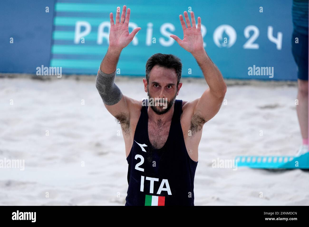 Italy's Paolo Nicolai acknowledges applause after defeating Sweden in a ...