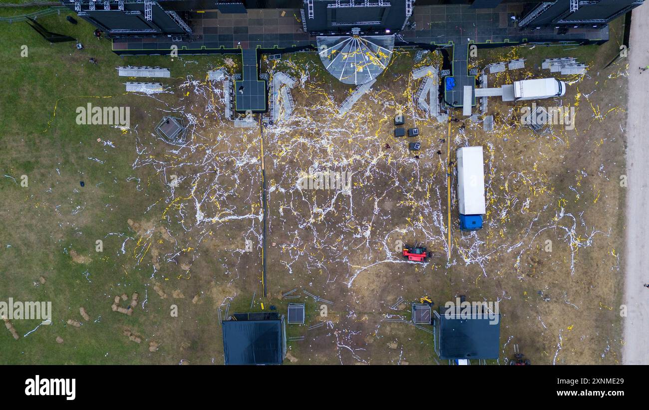 Drone photography of volunteers cleaning up trash and people ...