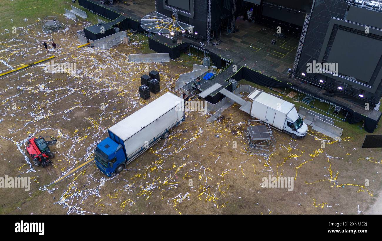 Drone photography of volunteers cleaning up trash and people ...