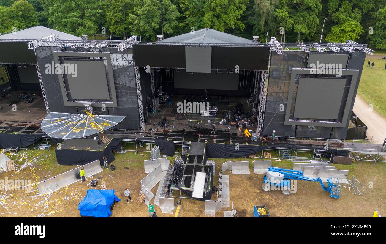 Drone photography of volunteers cleaning up trash and people ...