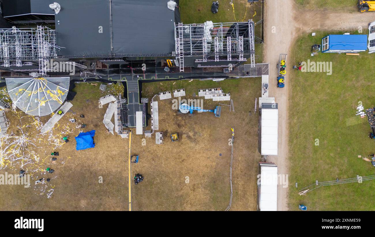 Drone photography of volunteers cleaning up trash and people ...