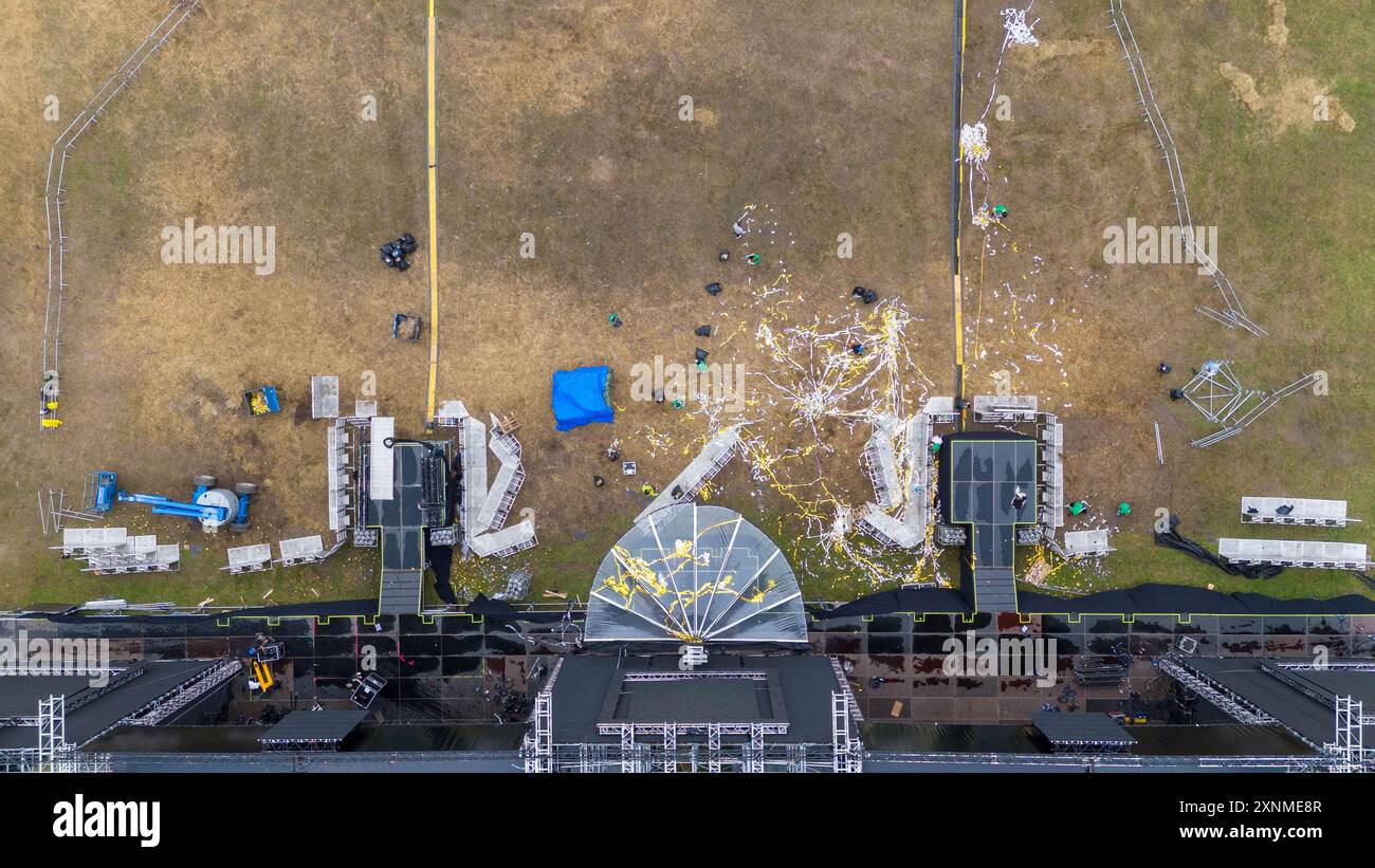 Drone photography of volunteers cleaning up trash and people ...