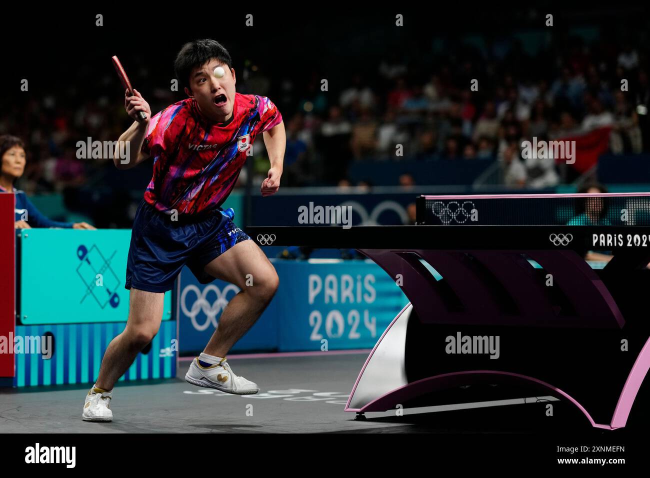 Japan's Tomokazu Harimoto plays against China's Fan Zhendong during a ...