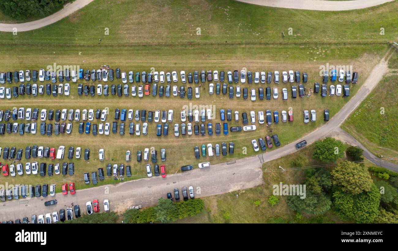 Drone photography of a music festival car park during summer cloudy day ...