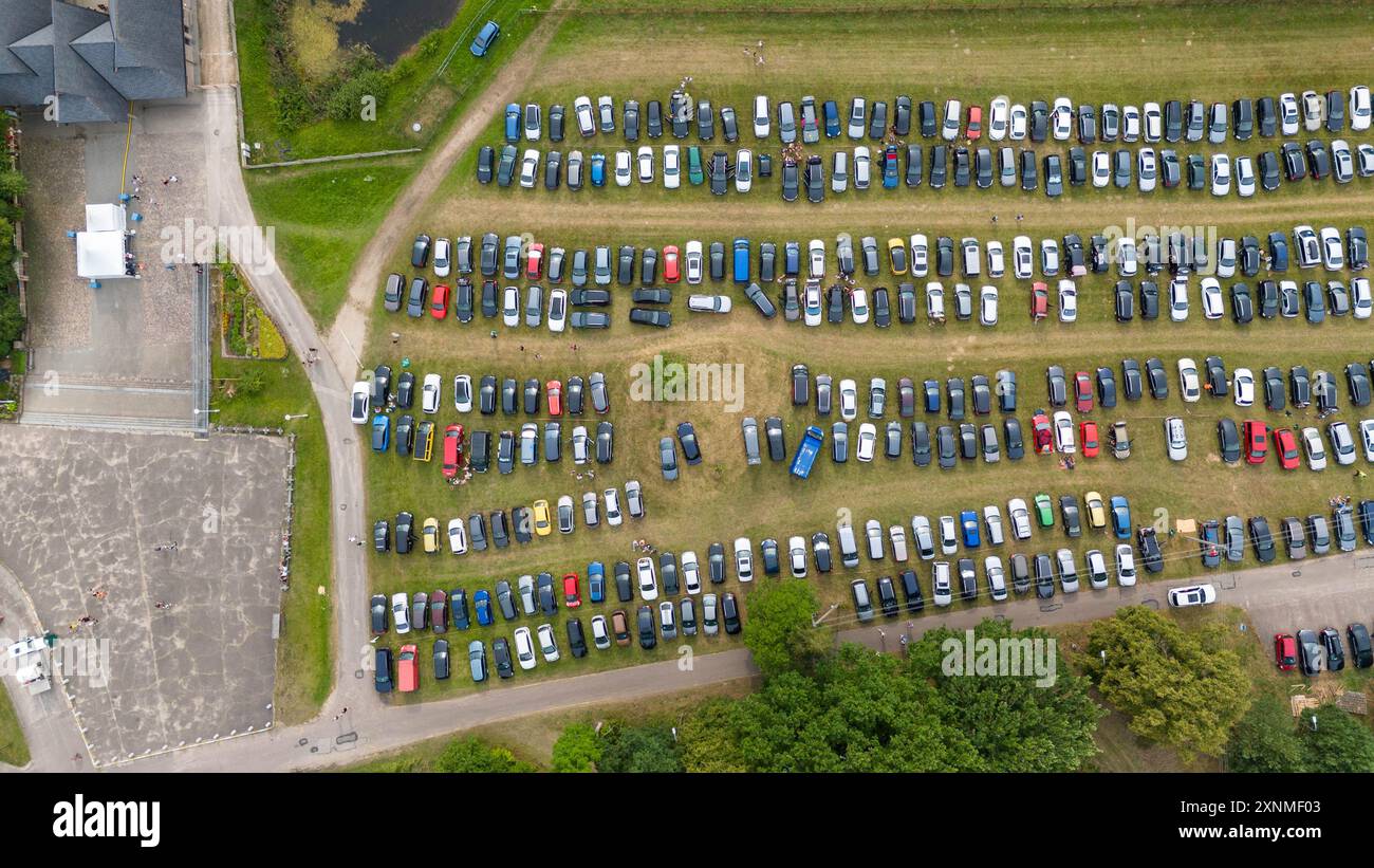 Drone photography of a music festival car park during summer cloudy day ...