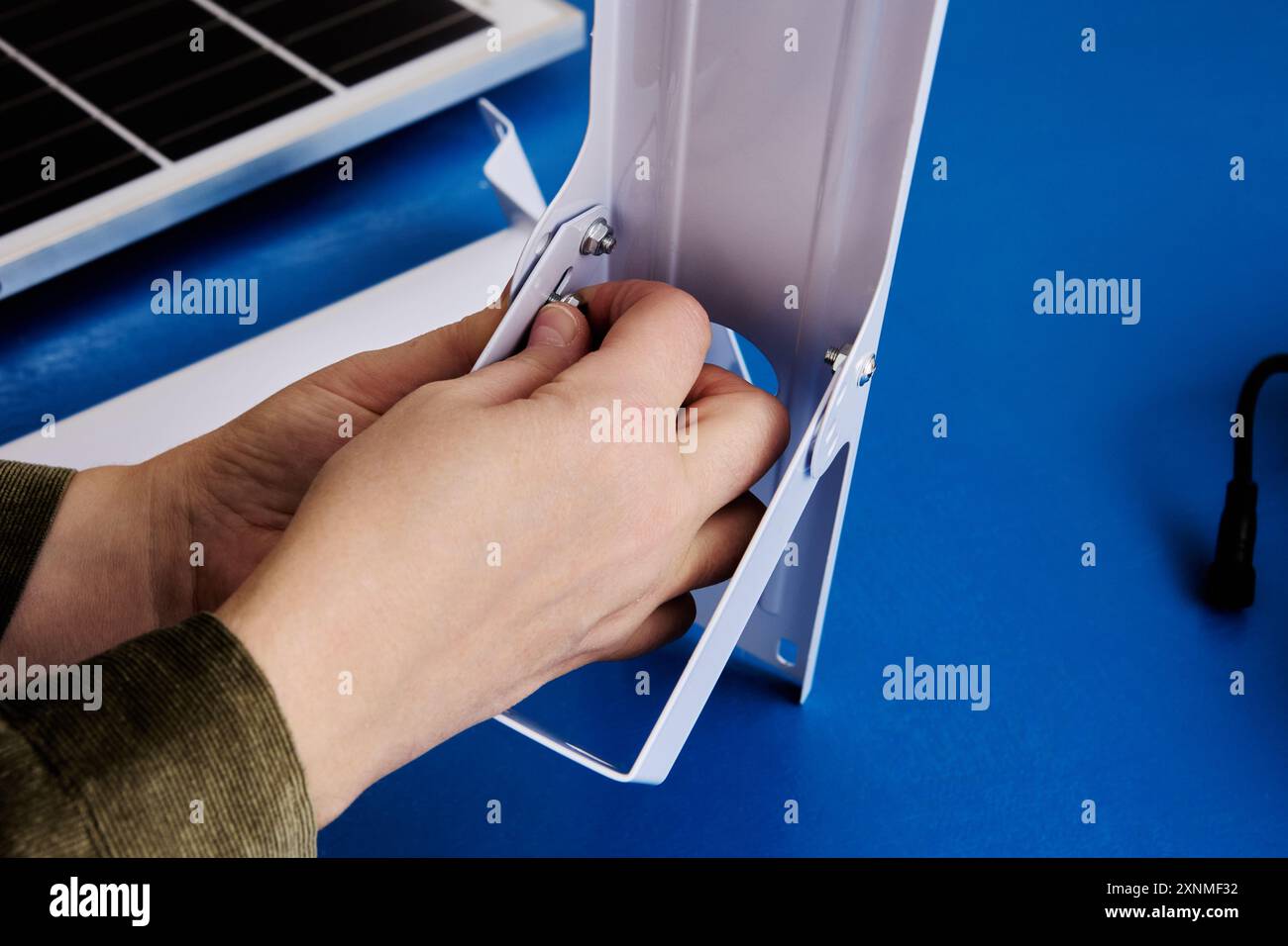 Bracket for mounting street light and solar panel, flat pack kit ...