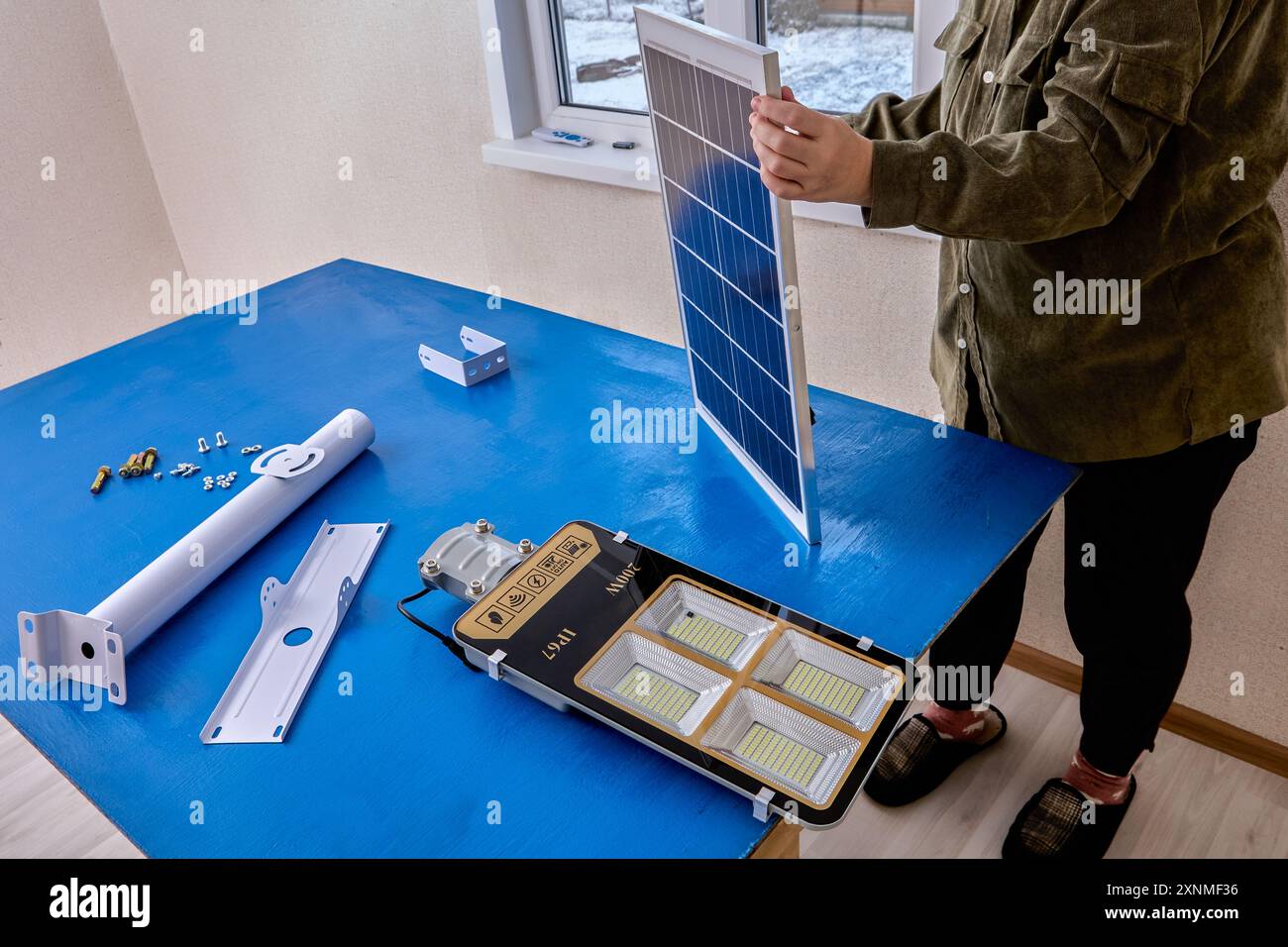 Bracket for mounting solar panel and LED light of street lighting, user ...