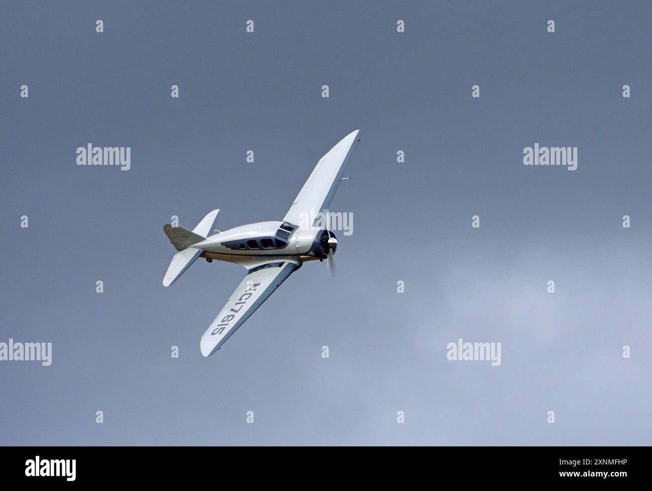 Vintage Yakovlev Yak 18T in flight against blue sky Stock Photo - Alamy