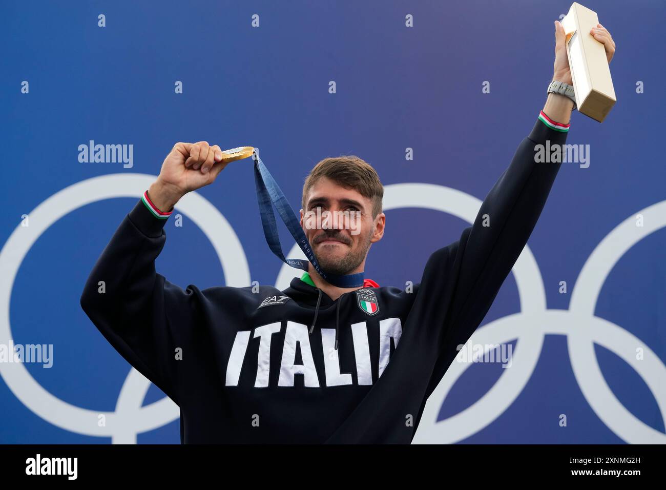 Gold medalist Giovanni de Gennaro of Italy poses during a medals ceremony for the men's kayak ...