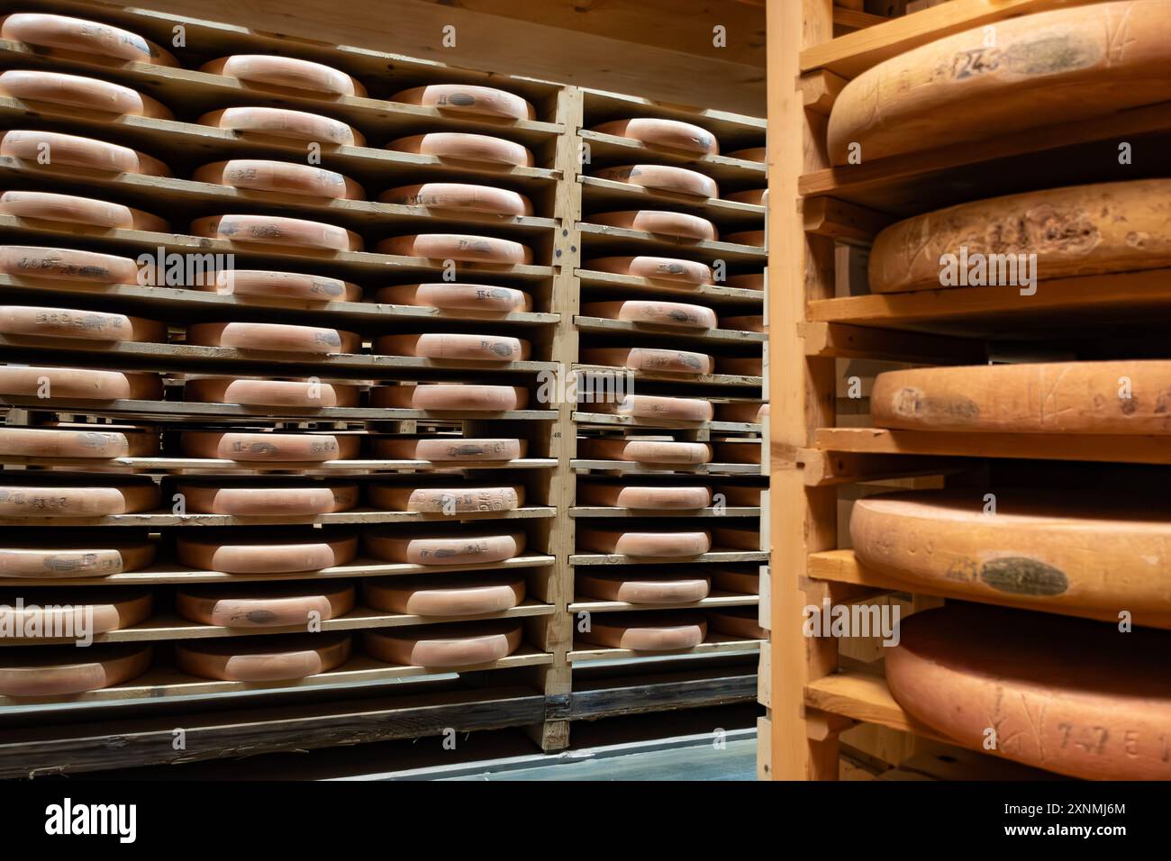 Aging rooms with many shelves in cheese caves, central location for ...