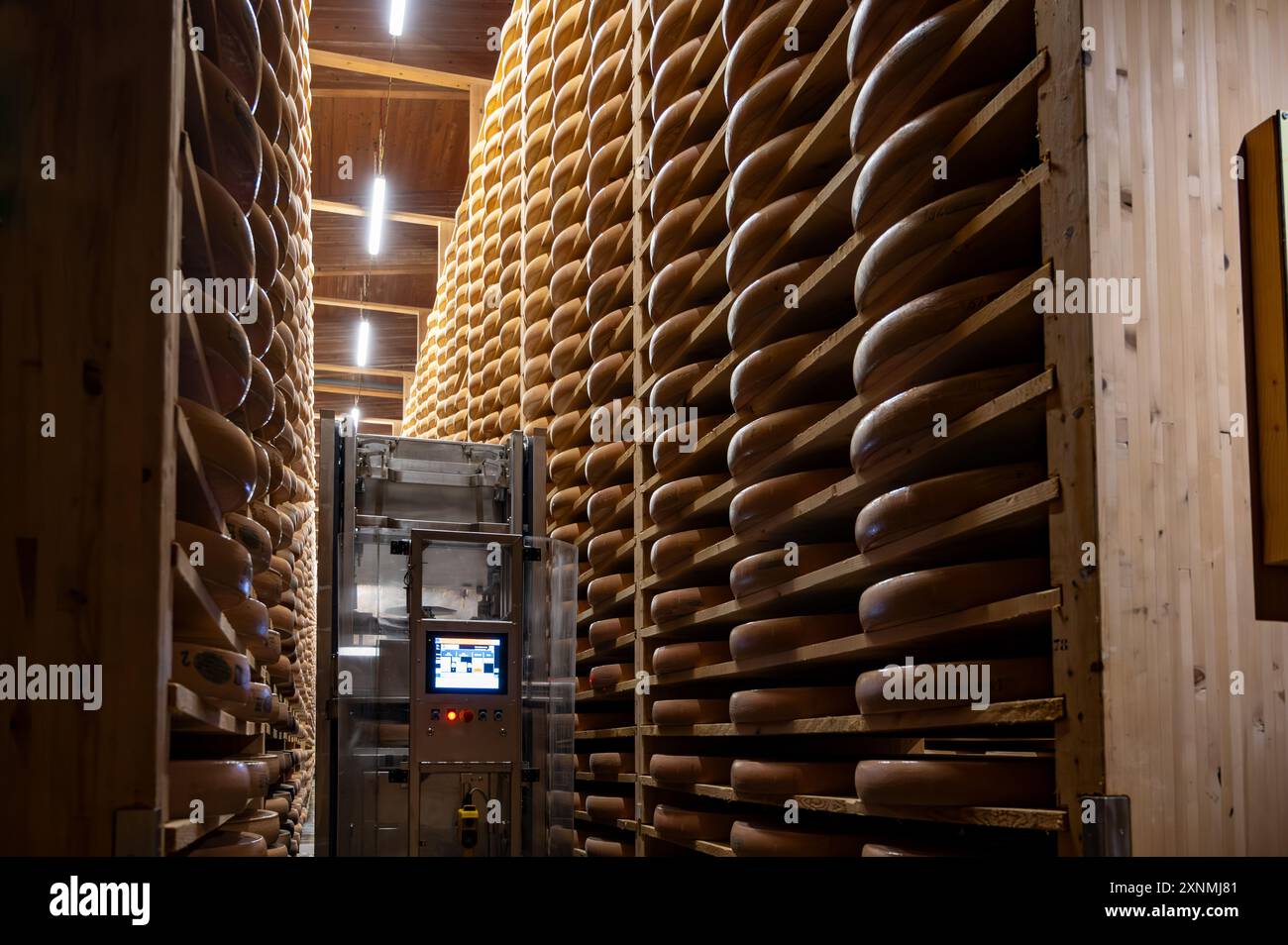 Aging rooms with many shelves in cheese caves, central location for ...