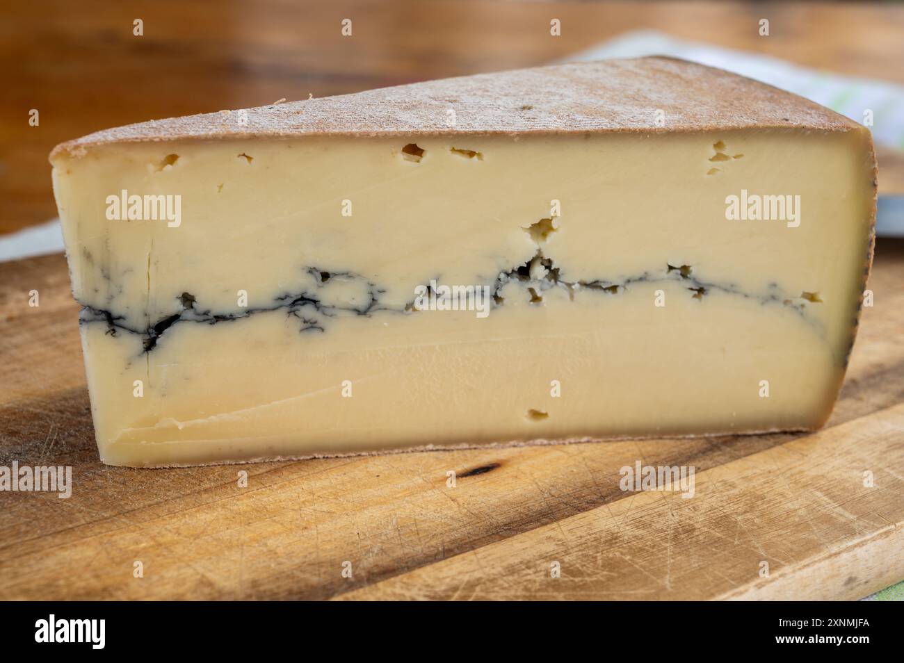 Cheese collection, French Morbier semi-soft cow milk cheese with black ...