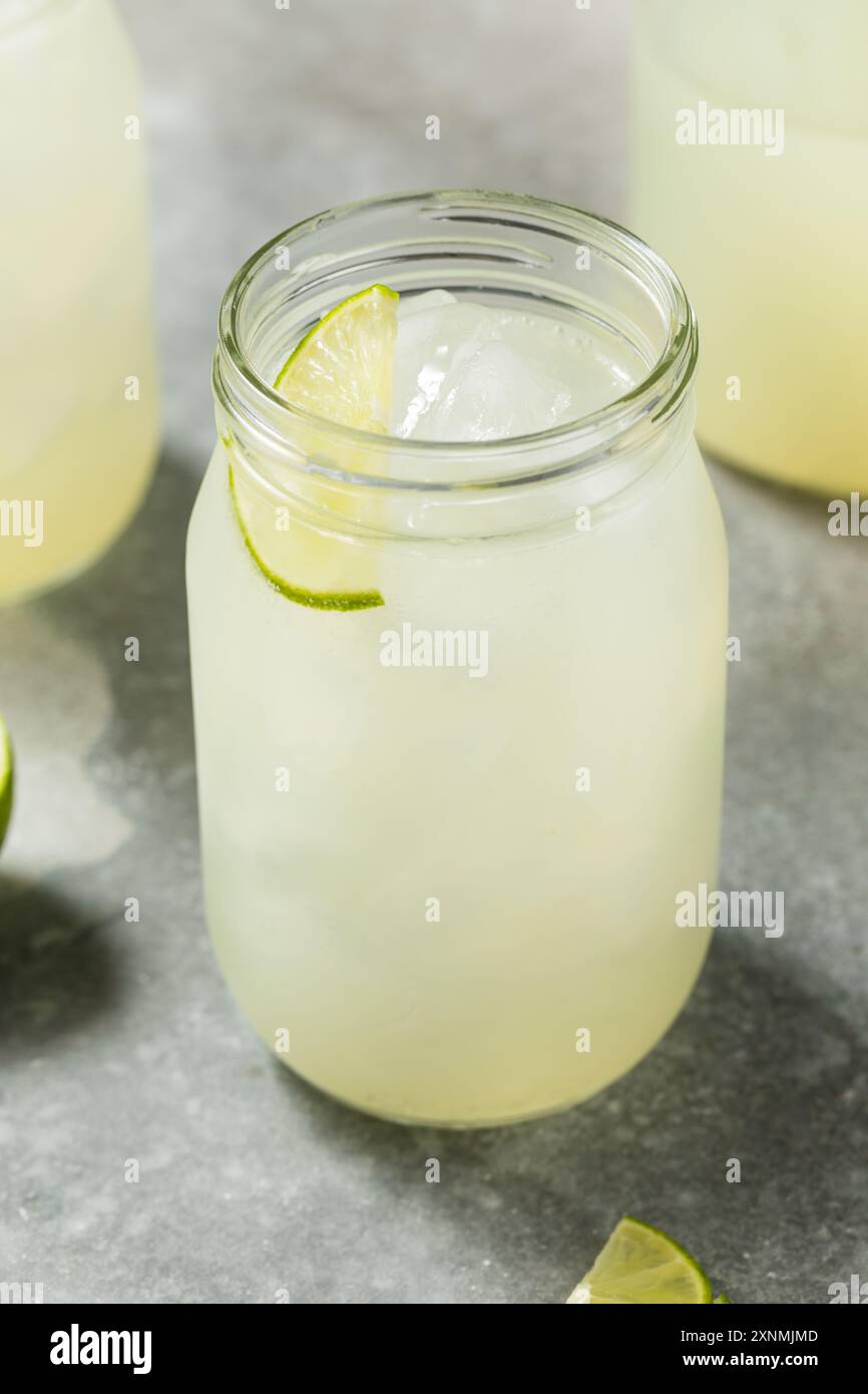 Cold Refreshing Lime Limeade with Sugar and Ice Stock Photo - Alamy