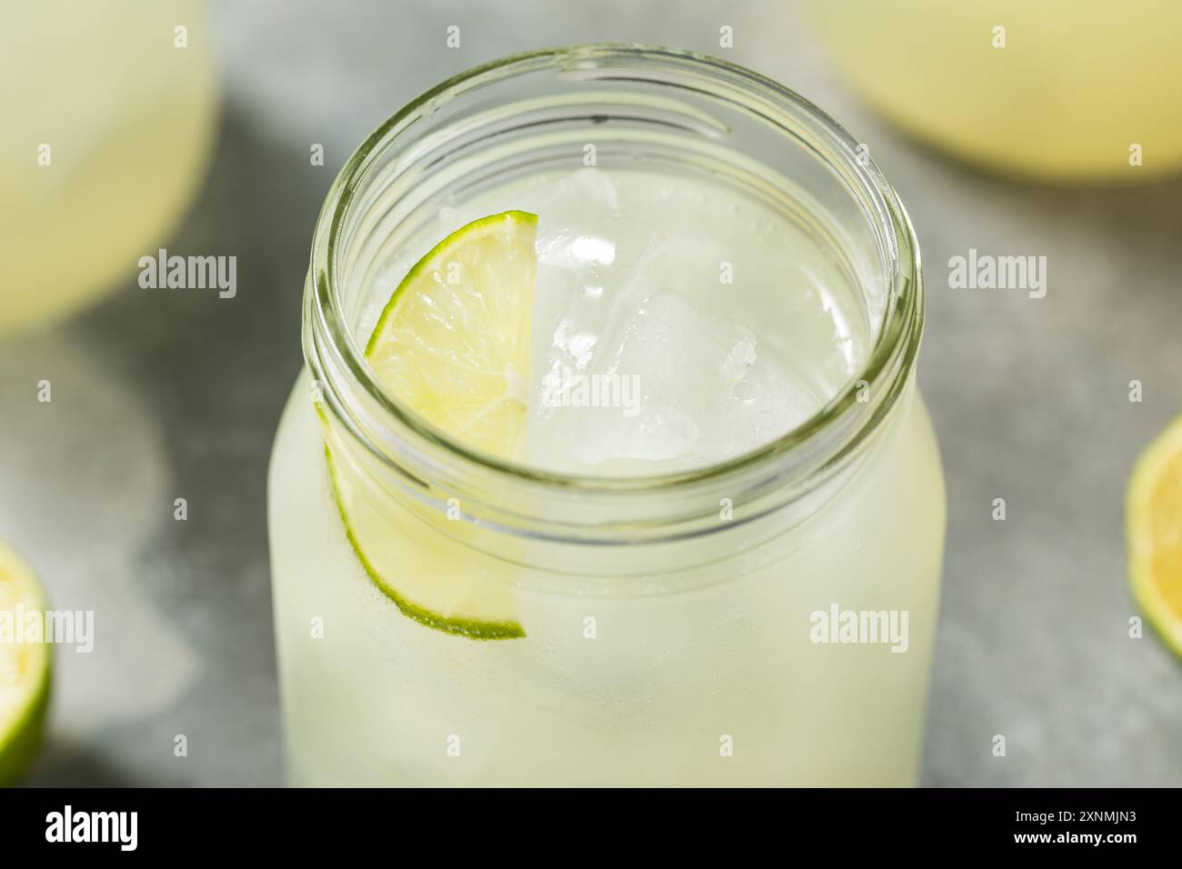 Cold Refreshing Lime Limeade with Sugar and Ice Stock Photo - Alamy