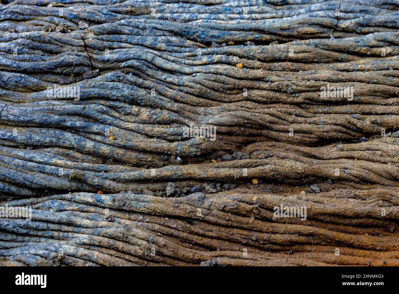 Solidified lava flow shows texture of wrinkles and lines Stock Photo ...