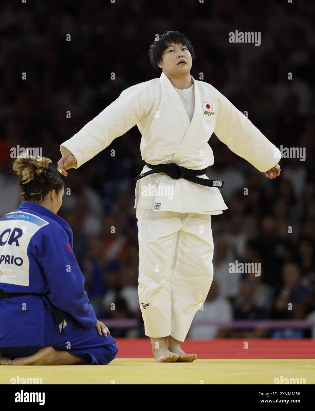 Japan's Rika Takayama (white) reacts after losing to Portugal's ...