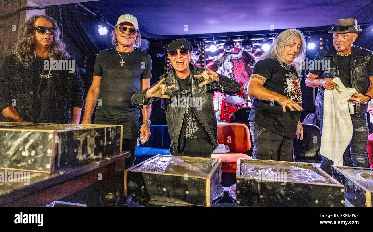 Wacken, Germany. 01st Aug, 2024. The Scorpions press their hands into ...