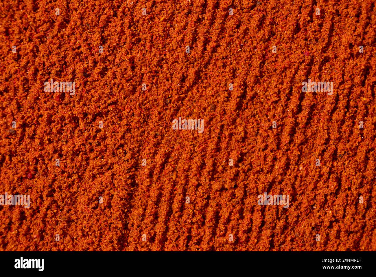 Ground paprika, red terracotta spice background, art in cooking Stock ...