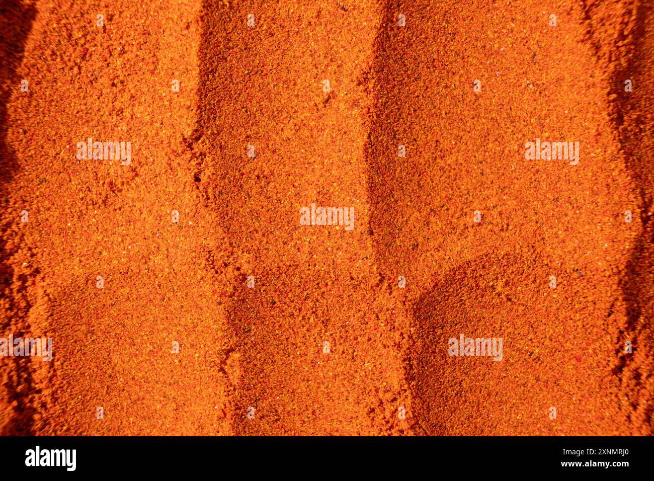 Ground paprika, red terracotta spice background, art in cooking Stock ...