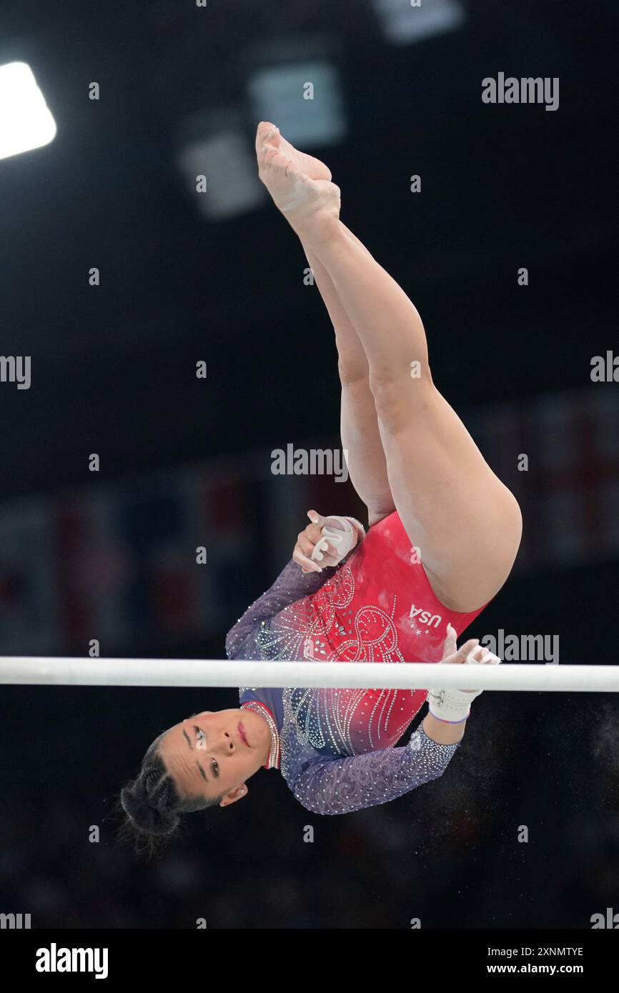 Suni Lee, of the United States, performs on the uneven bars during the ...