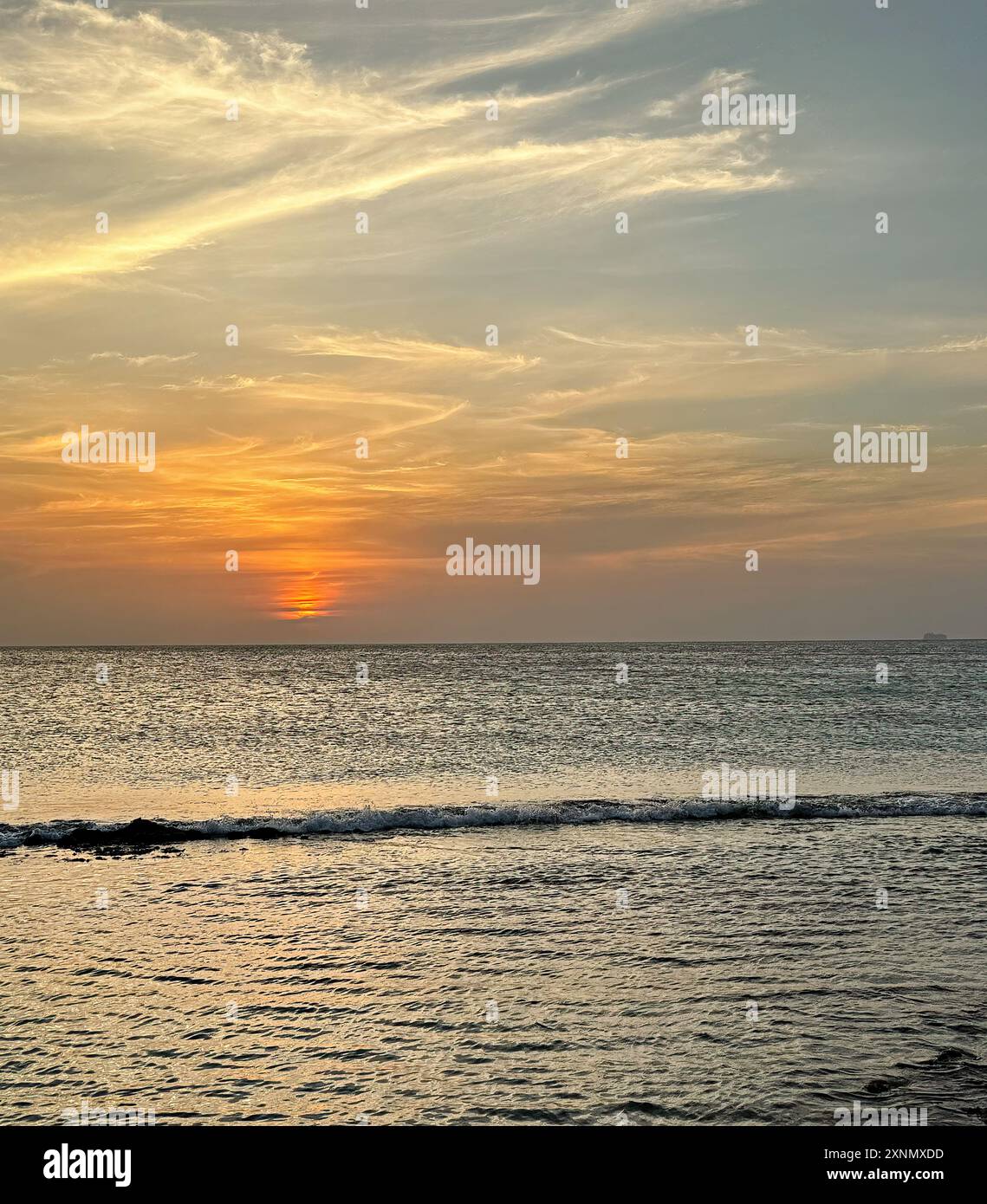 Beach and sea at sunset in Curacao Stock Photo - Alamy